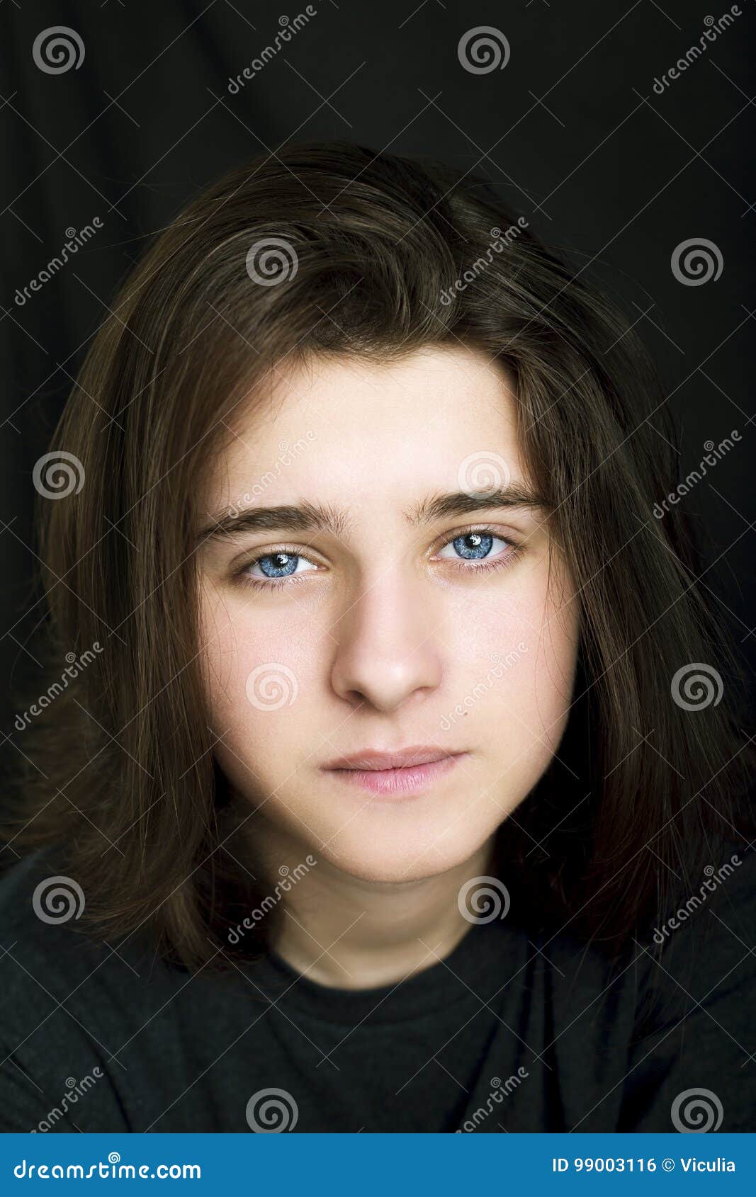 A Portrait of a Handsome Blue Eyes Teenager on Dark Background Stock ... A Portrait of a Handsome Blue Eyes Teenager on Dark Background Stock ...