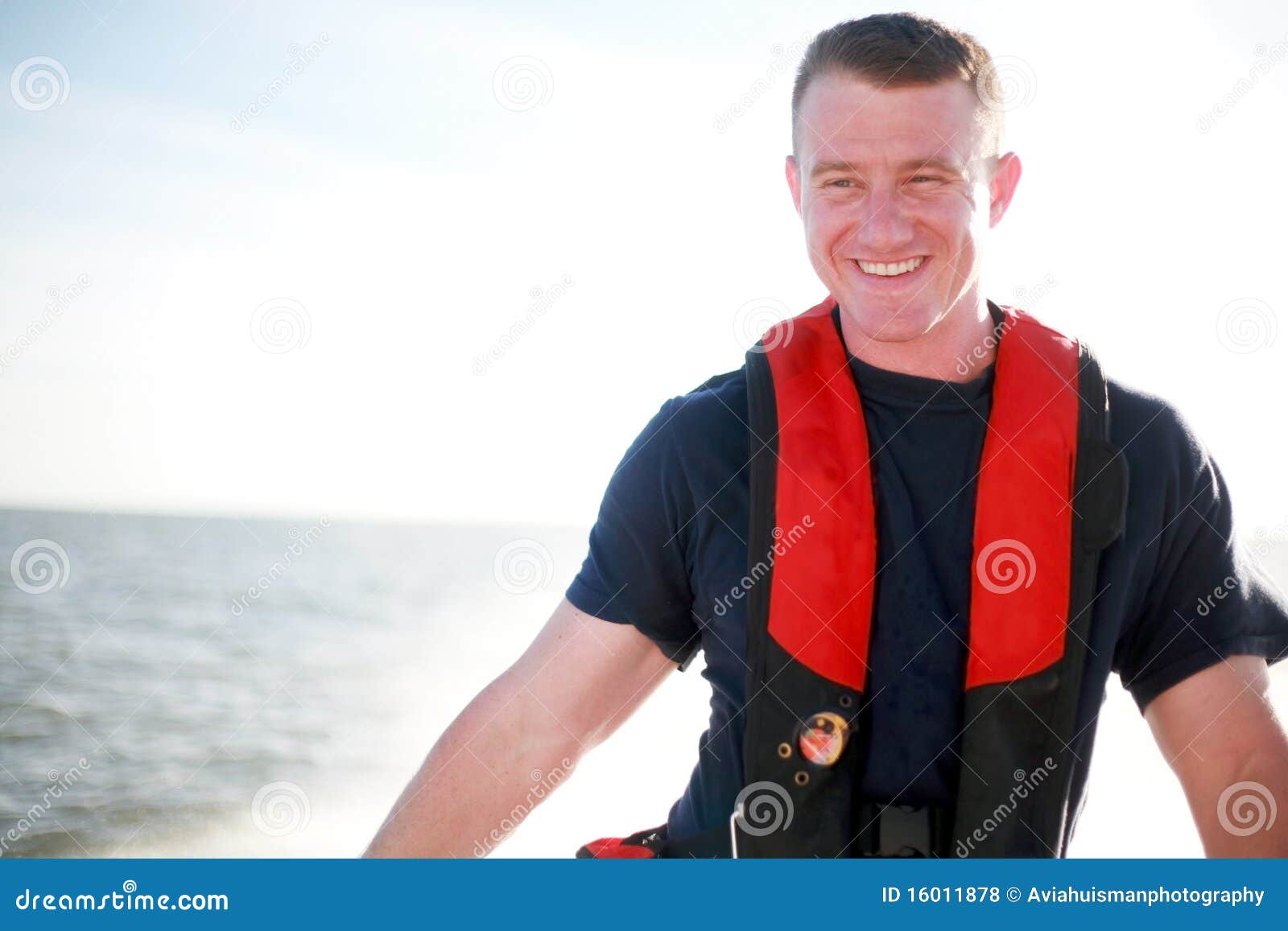 Handsome Boater stock photo. Image of lifejacket, summer - 16011878