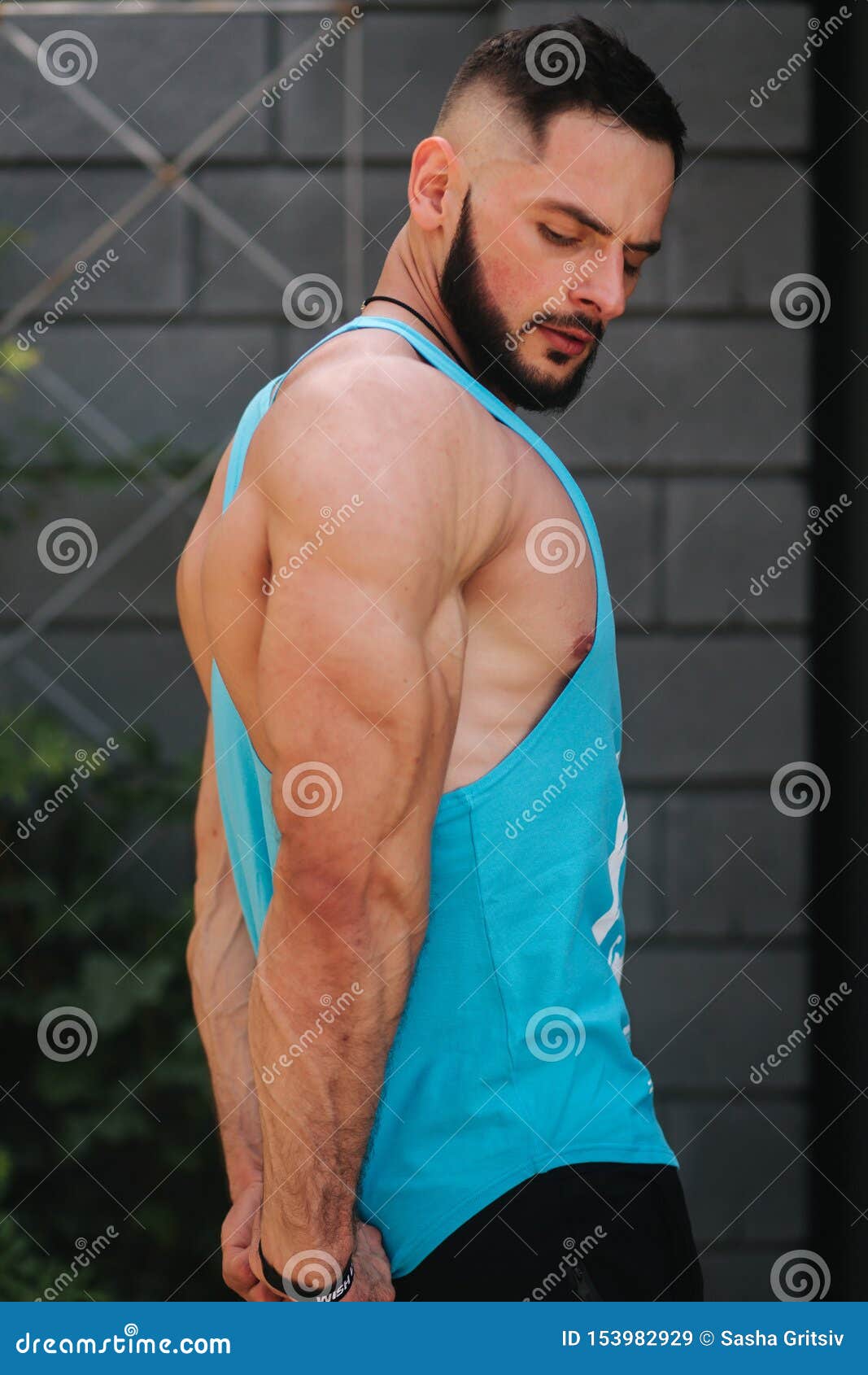Handsome Bodybuilder in Blue Singlet Posing Outside. Bearden Men before ...
