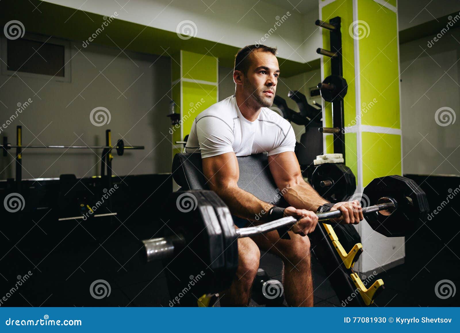 Handsome Bodybuilder Pumping Up Hands in Gym Stock Photo - Image of ...