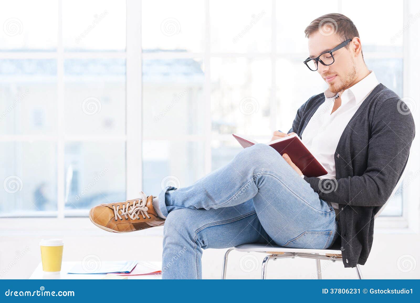 Handsome bookworm. stock image. Image of inspiration - 37806231