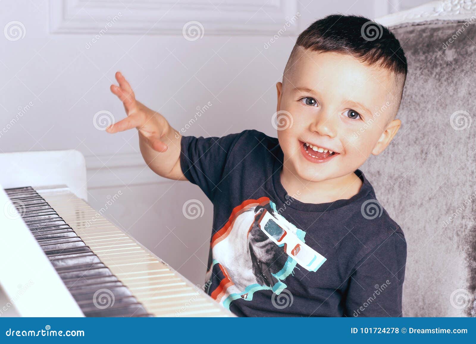 Boy playing the piano stock photo. Image of piano, home - 101724278