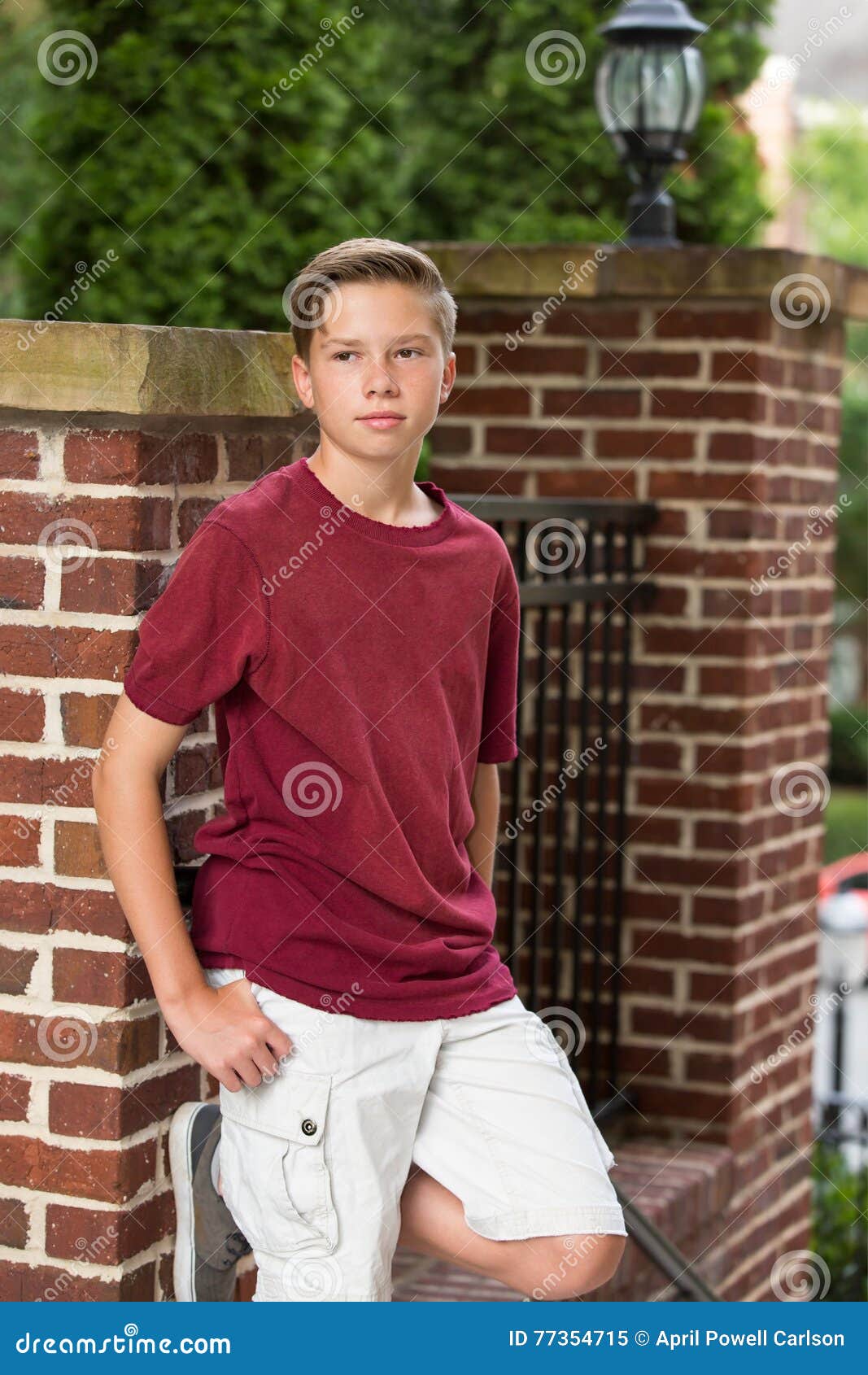 Handsome Boy Posing in Park Stock Image - Image of brick, looking: 77354715