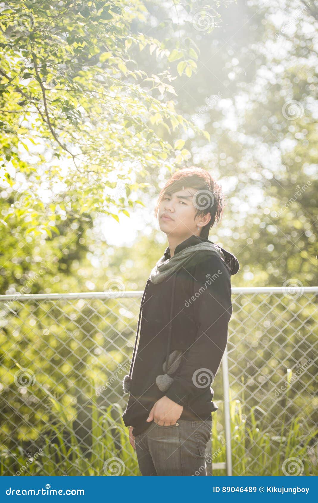 The Handsome Boy Standing among the Sun Stock Image - Image of outdoor ...