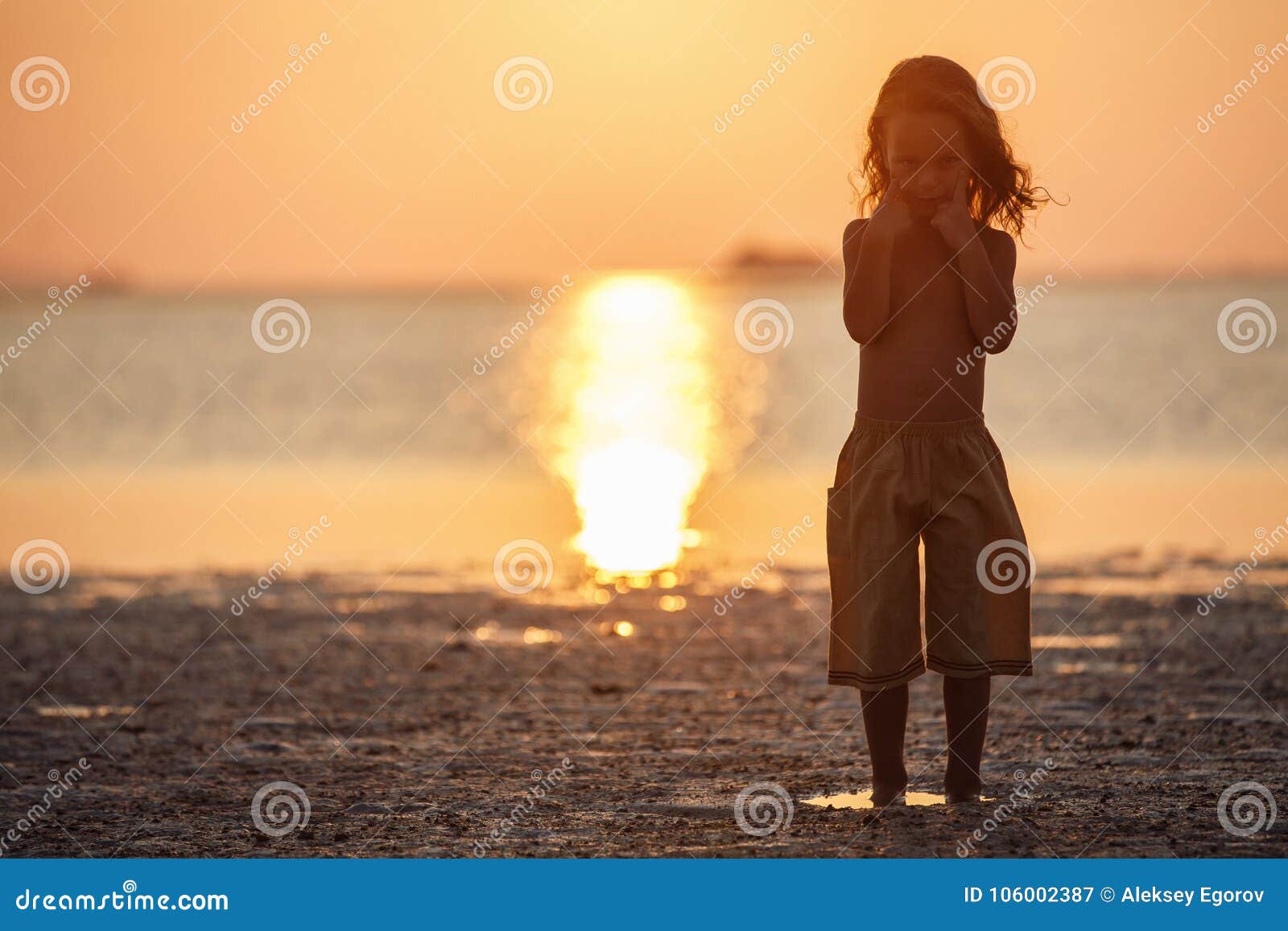 Handsome boy at sunset stock image. Image of health - 106002387