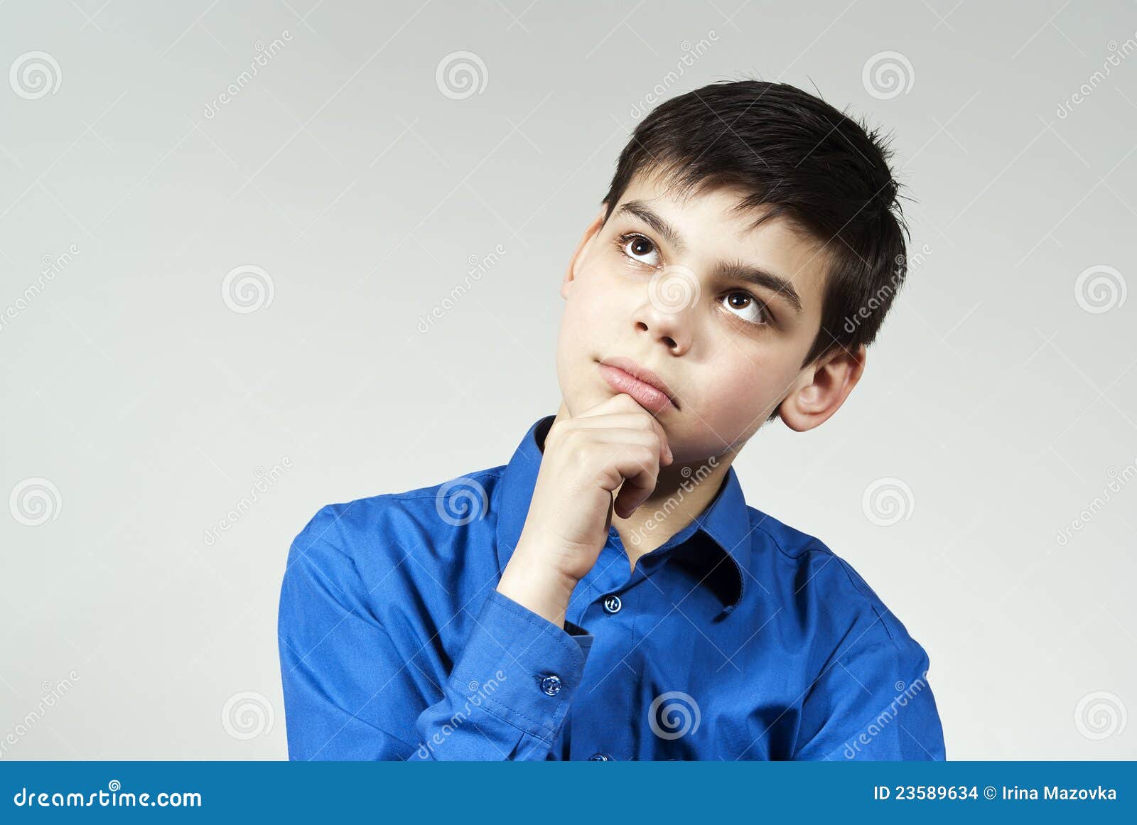 Handsome boy thinks stock photo. Image of cheerful, expressions - 23589634