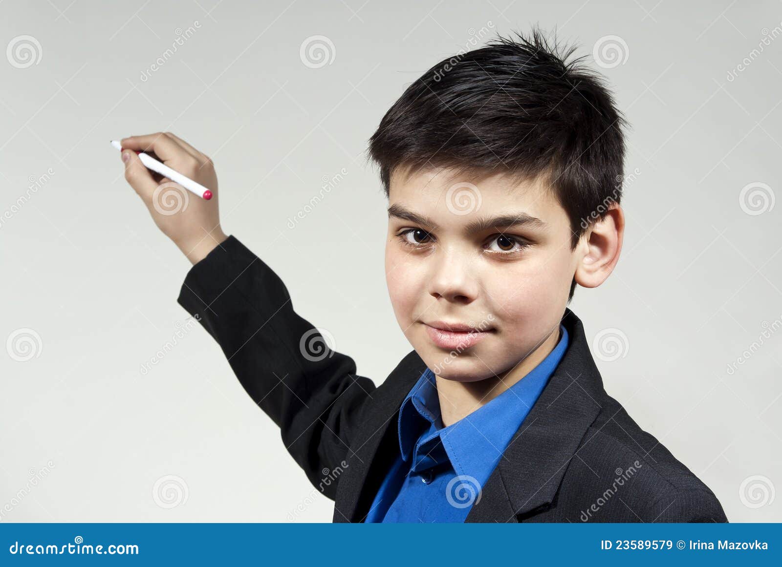 Handsome boy writes stock image. Image of ballpoint, people - 23589579