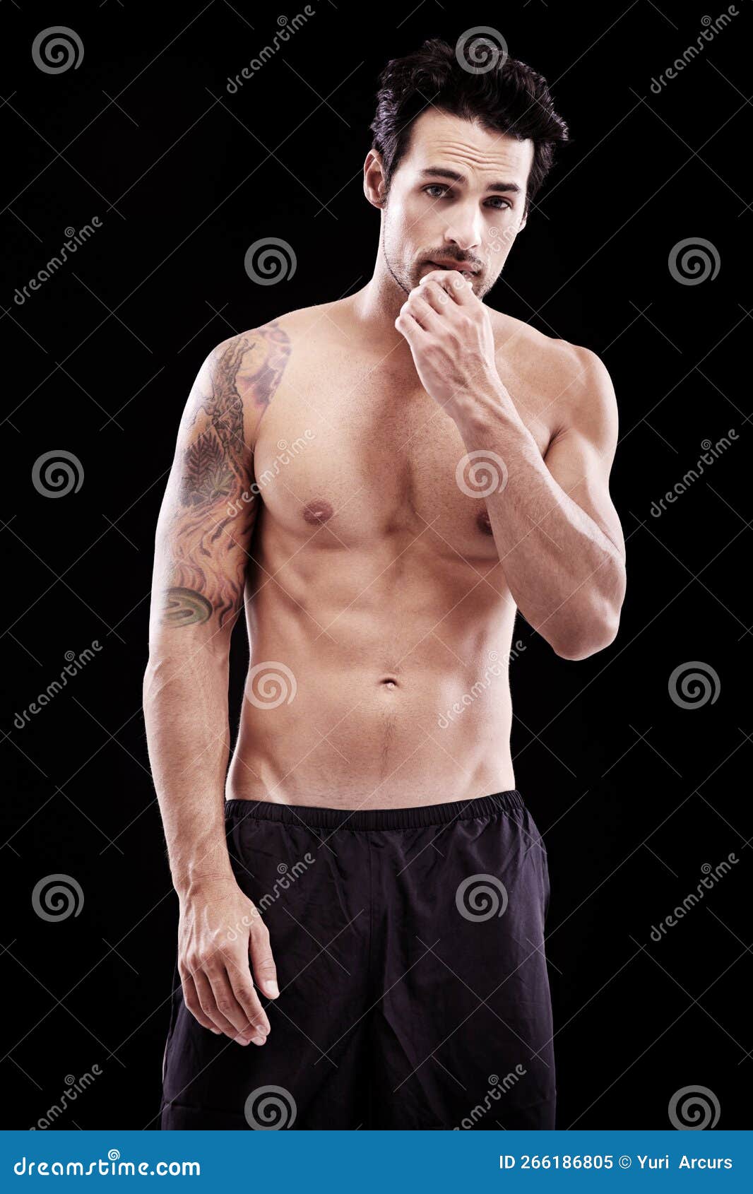 Handsome and Brooding. Studio Shot of a Bare-chest and Fit Young Man ...