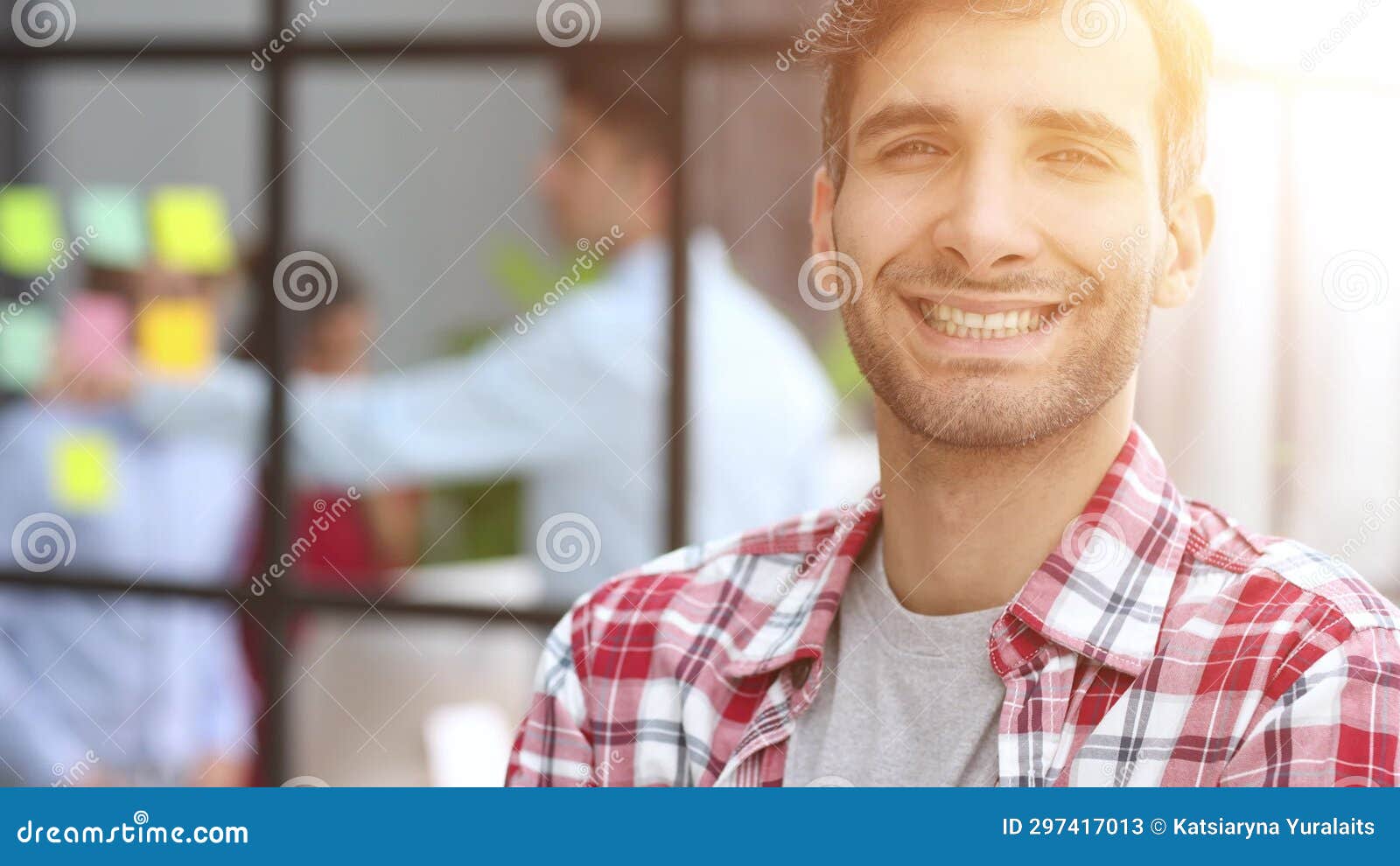 Portrait Of Casual Smiling Caucasian Male Worker Laughing Looking At