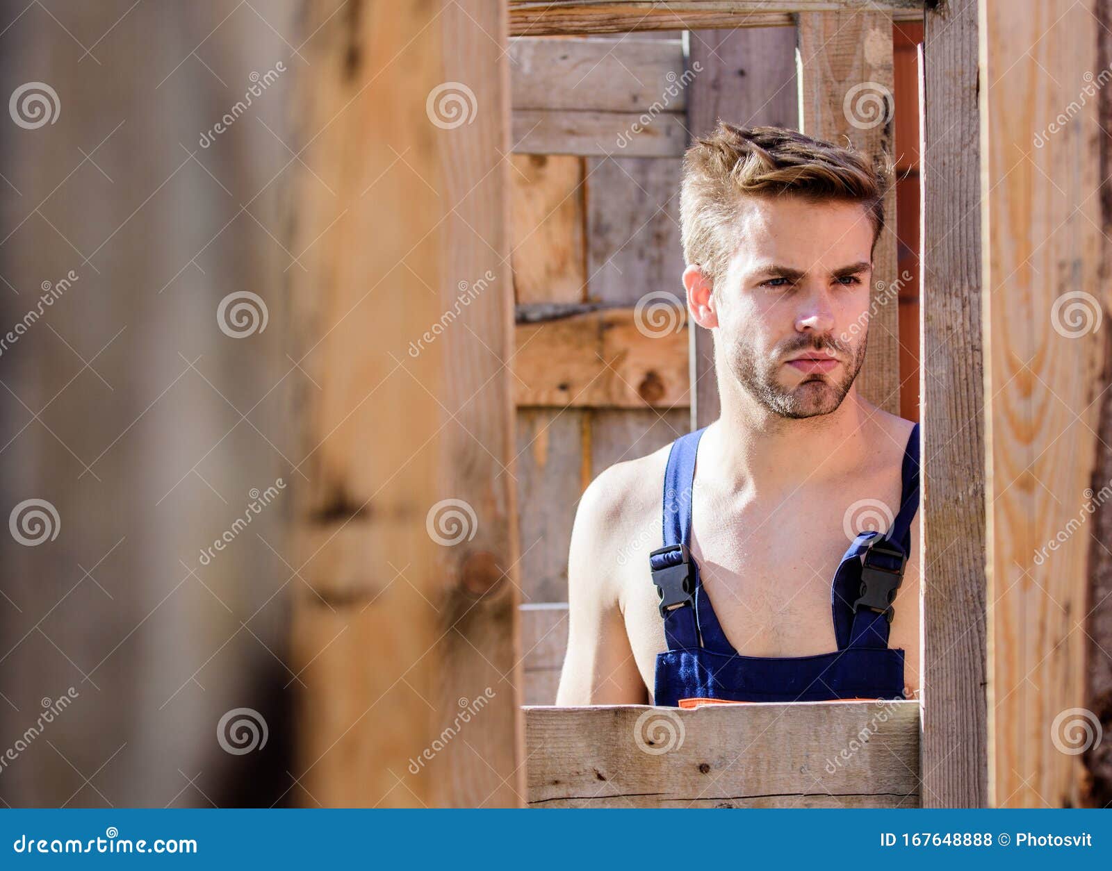 Handsome Builder at Construction Site. Guy Works at Construction ...