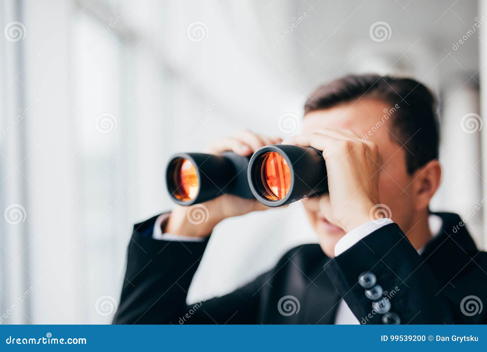 Business Man Looking with Binoculars Over Panoramic Windows Stock Photo ...