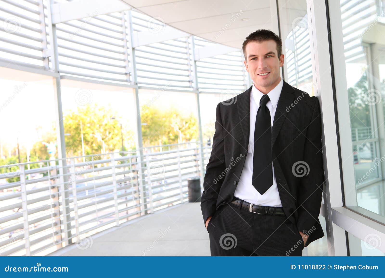 Handsome Business Man at Office Stock Photo - Image of building, adult ...