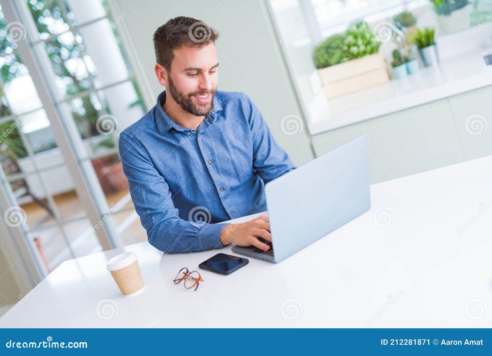 Handsome Business Man Working Using Computer Laptop and Smiling Stock ...