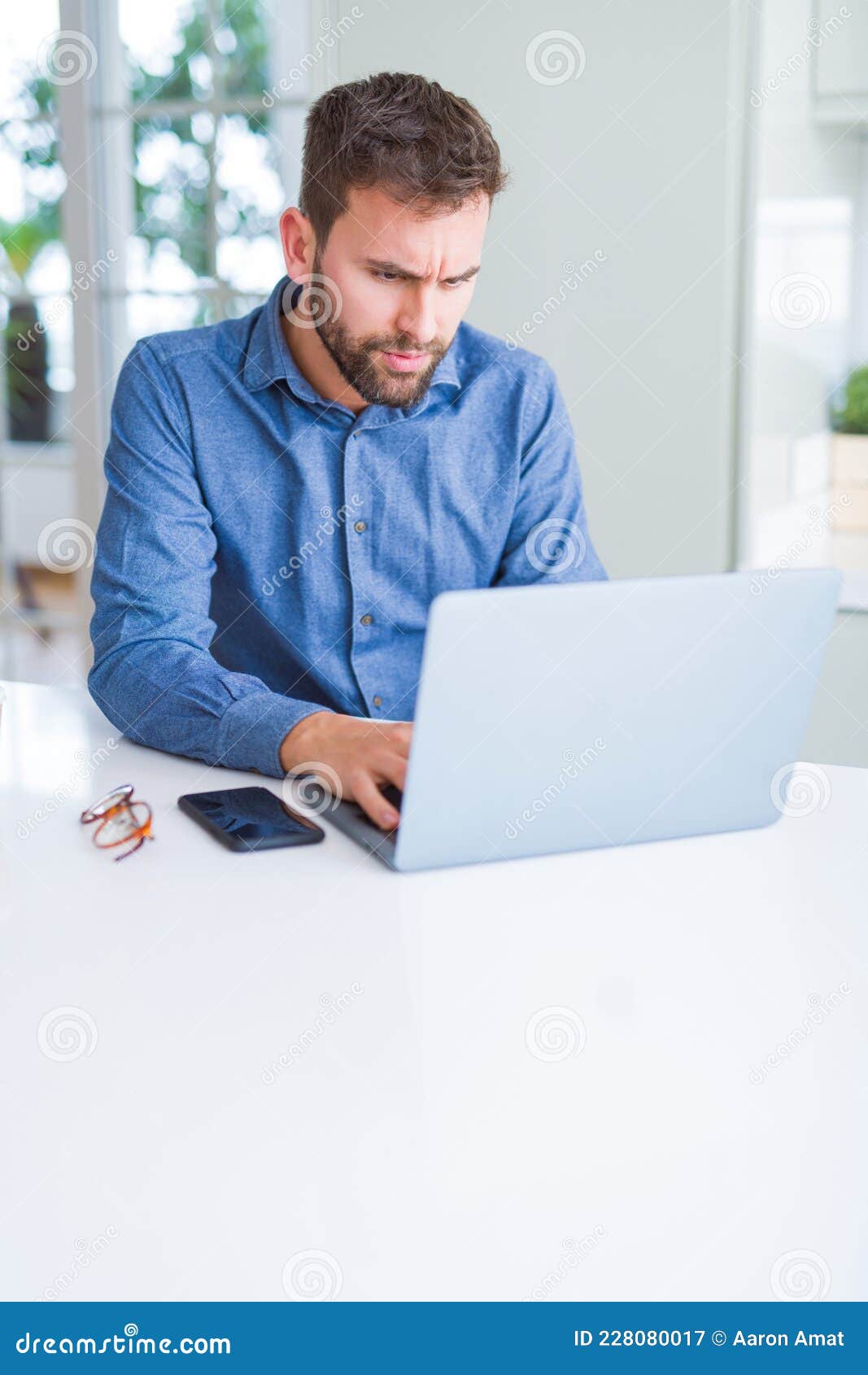 Handsome Business Man Working Using Computer Laptop and Smiling Stock ...