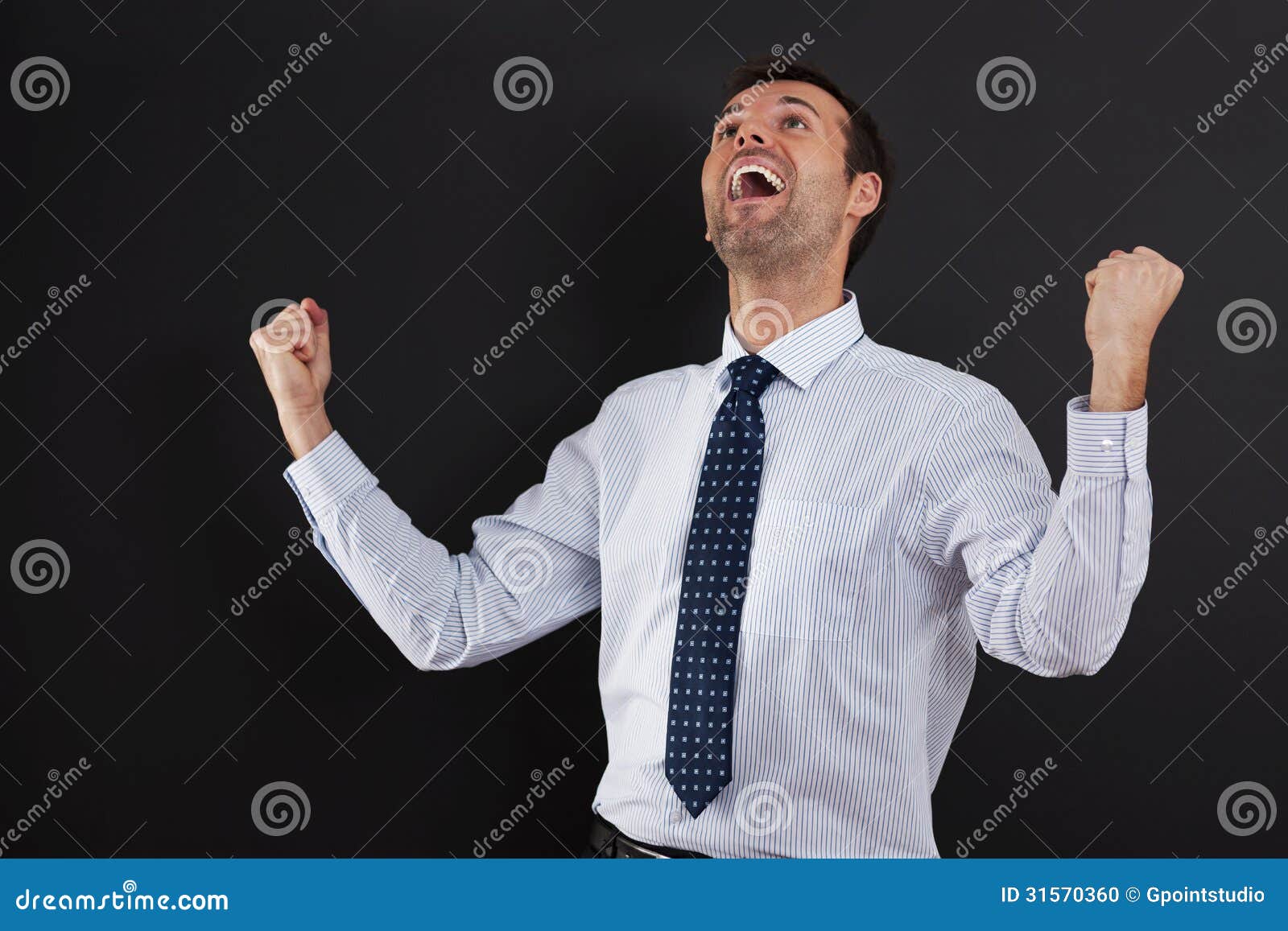 Handsome Young Man Excitedly Cheering Isolated Stock Photo