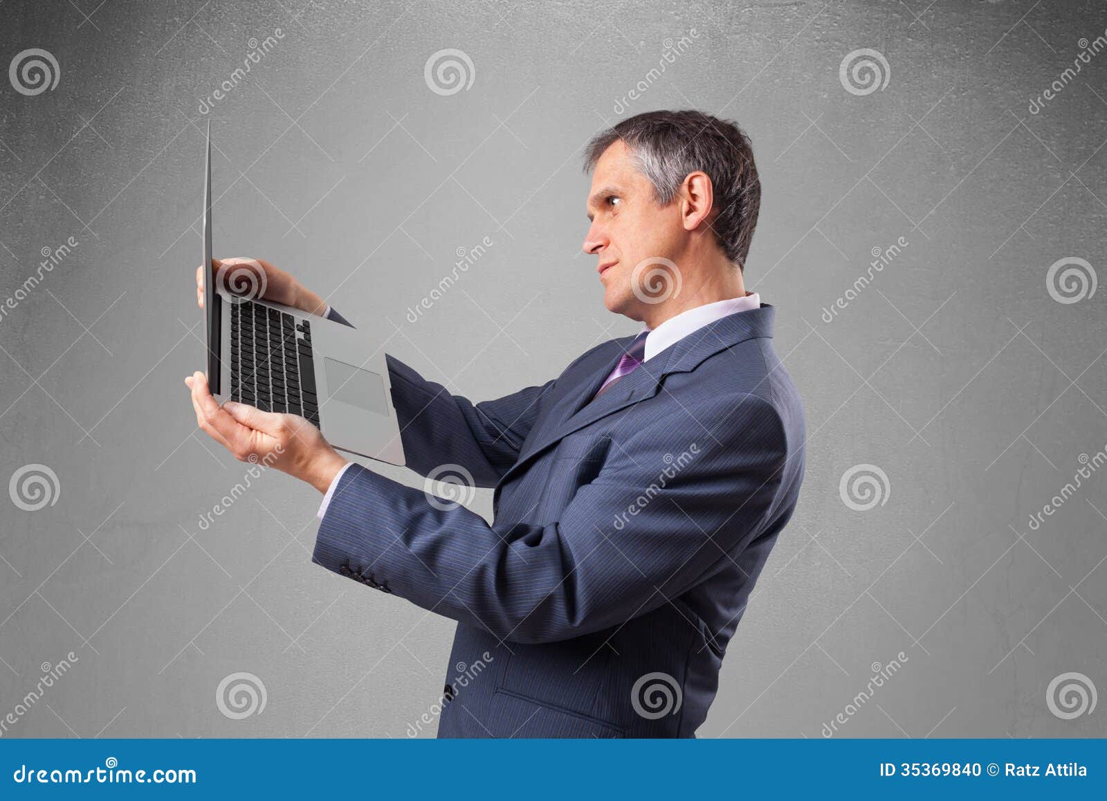 Handsome Businessman Holding Modern Laptop Stock Photo - Image of look ...