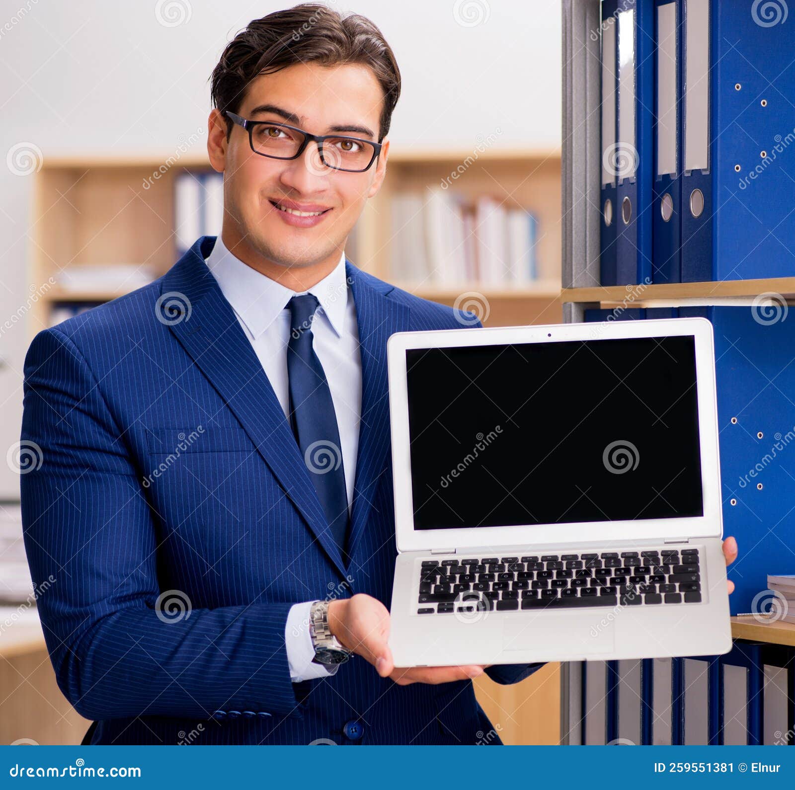 Handsome Businessman with Laptop in the Office Stock Image - Image of ...