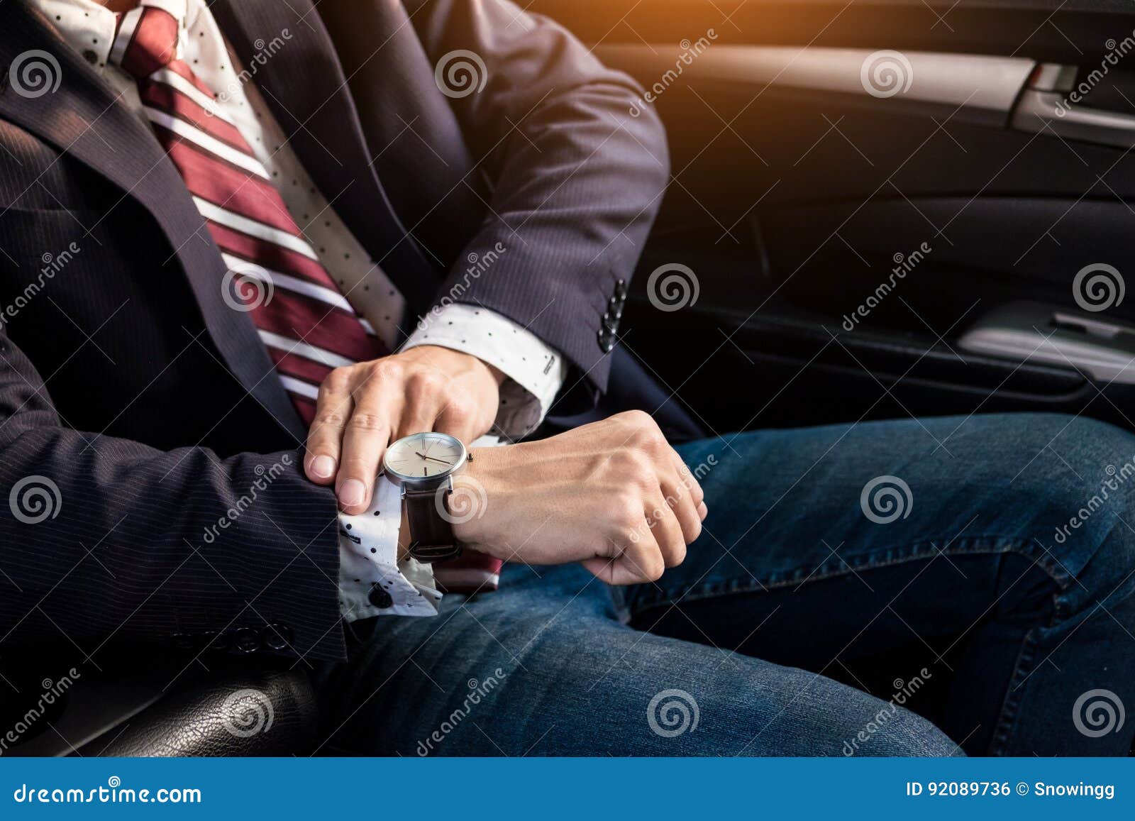 Handsome Businessman Looking on Wrist Watch in Car Stock Photo - Image ...