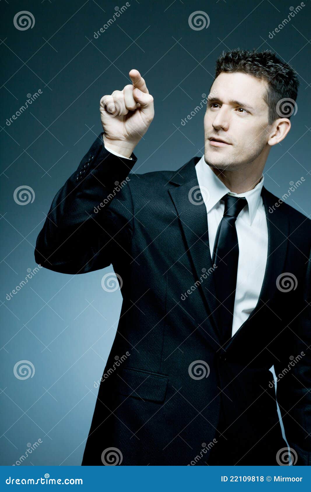 Handsome Businessman Making Pointing Gesture. Stock Photo - Image of ...