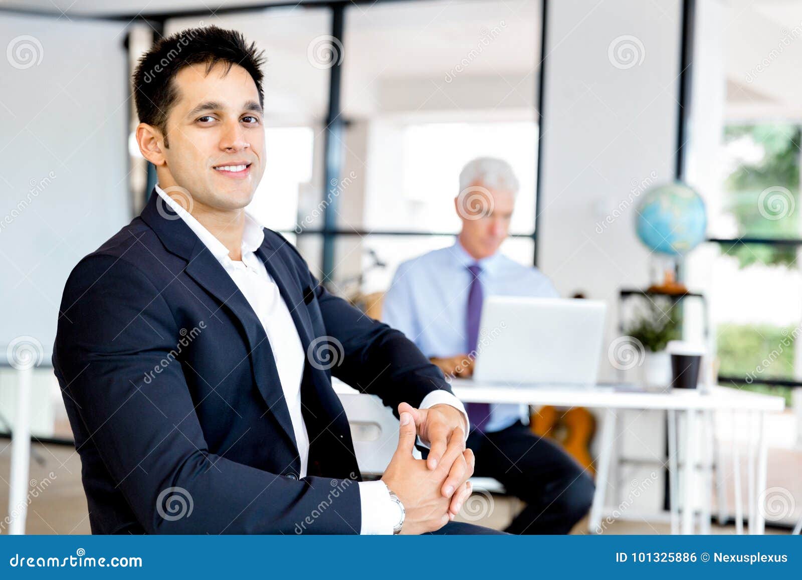 Businessman at the office stock photo. Image of business - 101325886
