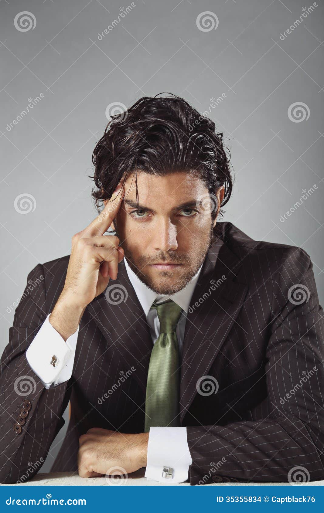 Handsome Businessman with Pensive Expression Stock Photo - Image of ...
