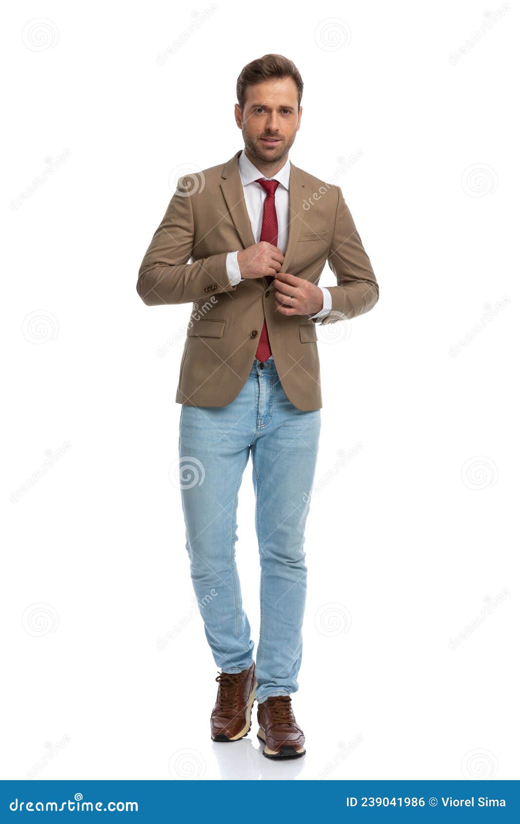 Handsome Businessman Pulling Something from His Jacket Stock Photo ...
