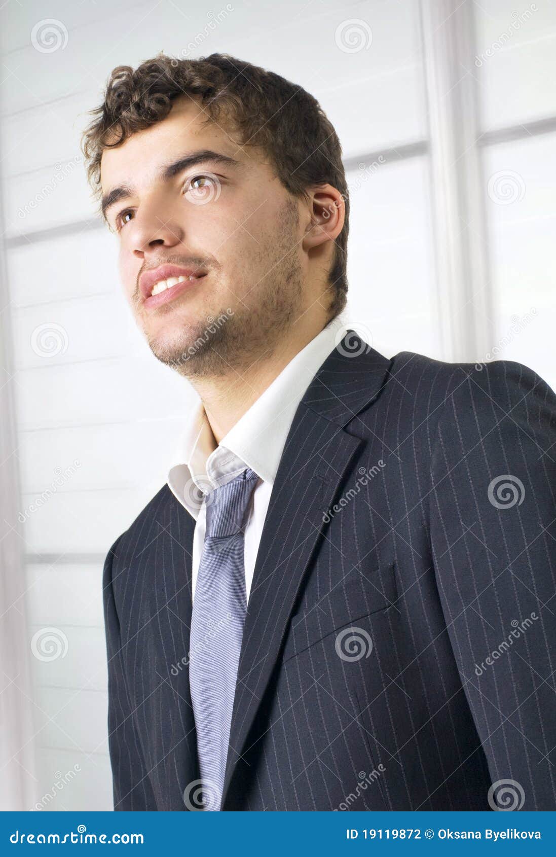 A Handsome Businessman Smiling Stock Photo - Image of person ... A Handsome Businessman Smiling Stock Photo - Image of person ...