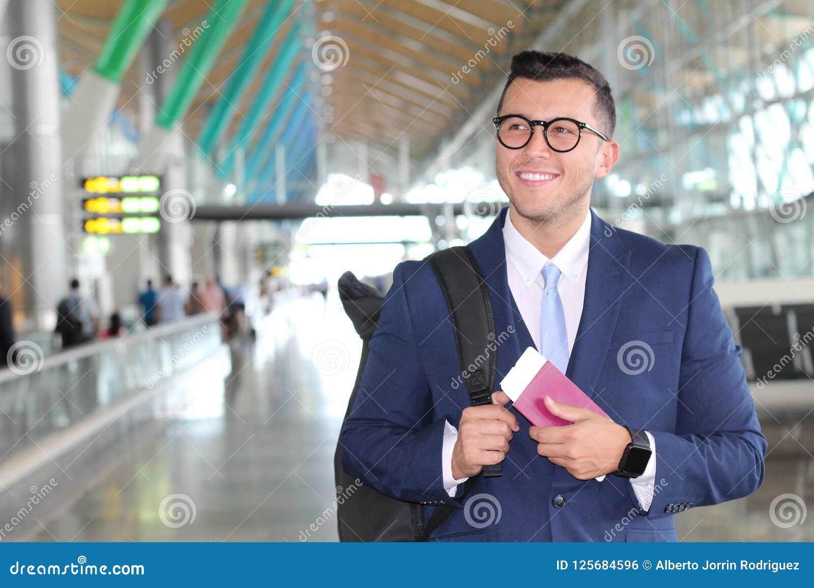 Handsome Businessman Smiling at the Airport with Space for Copy Stock ...