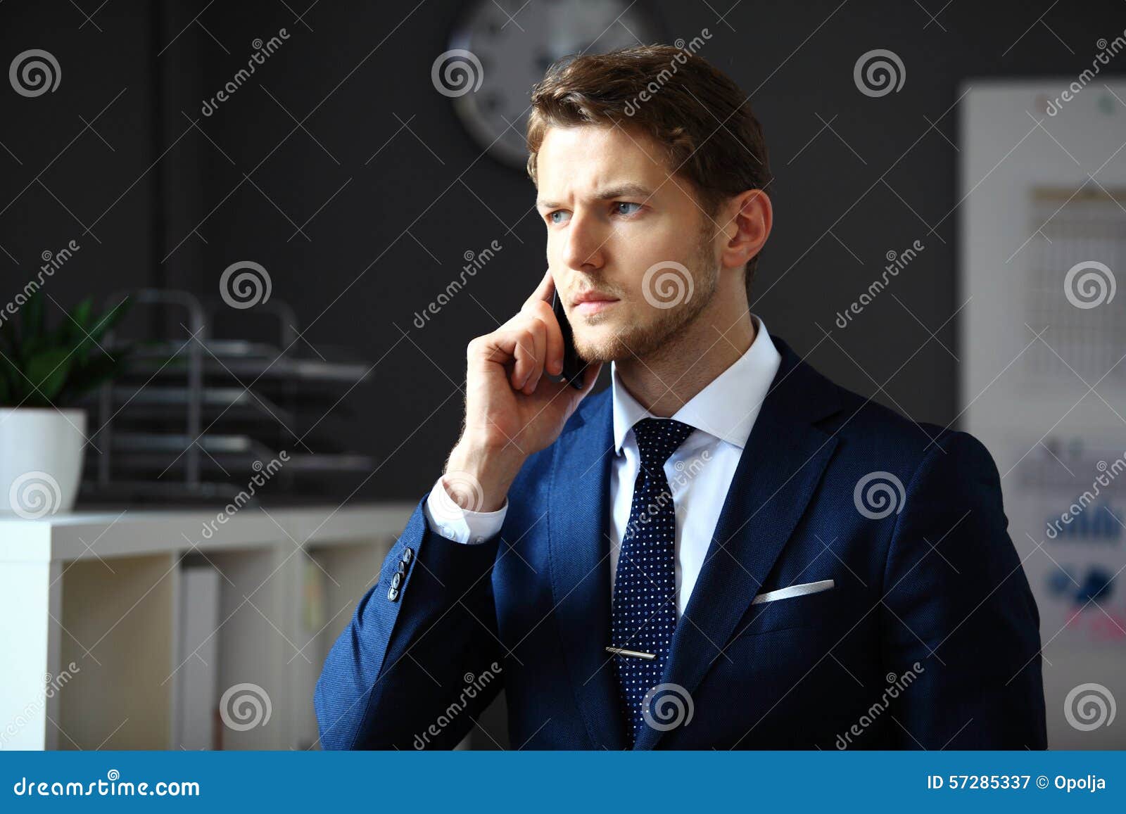 Handsome Businessman in Suit Speaking on the Phone Stock Image - Image ... Handsome Businessman in Suit Speaking on the Phone Stock Image - Image ...