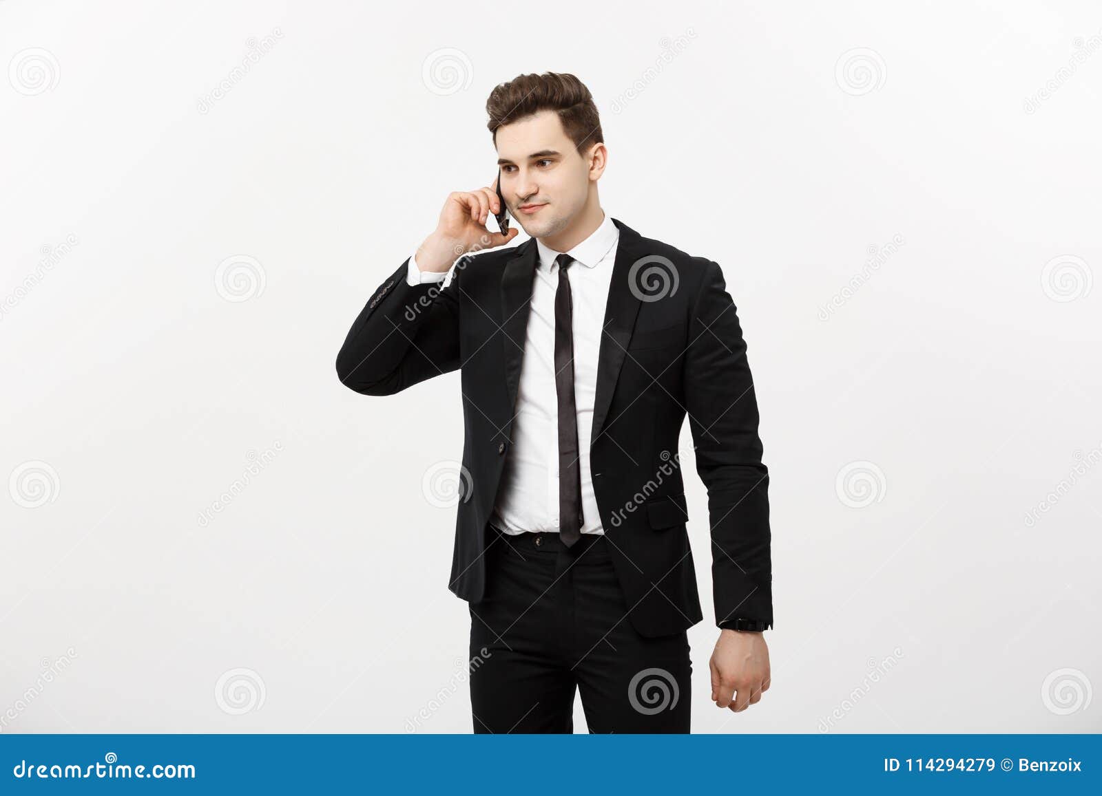 Handsome Businessman in Suit Speaking on the Phone Over Isolated White ... Handsome Businessman in Suit Speaking on the Phone Over Isolated White ...