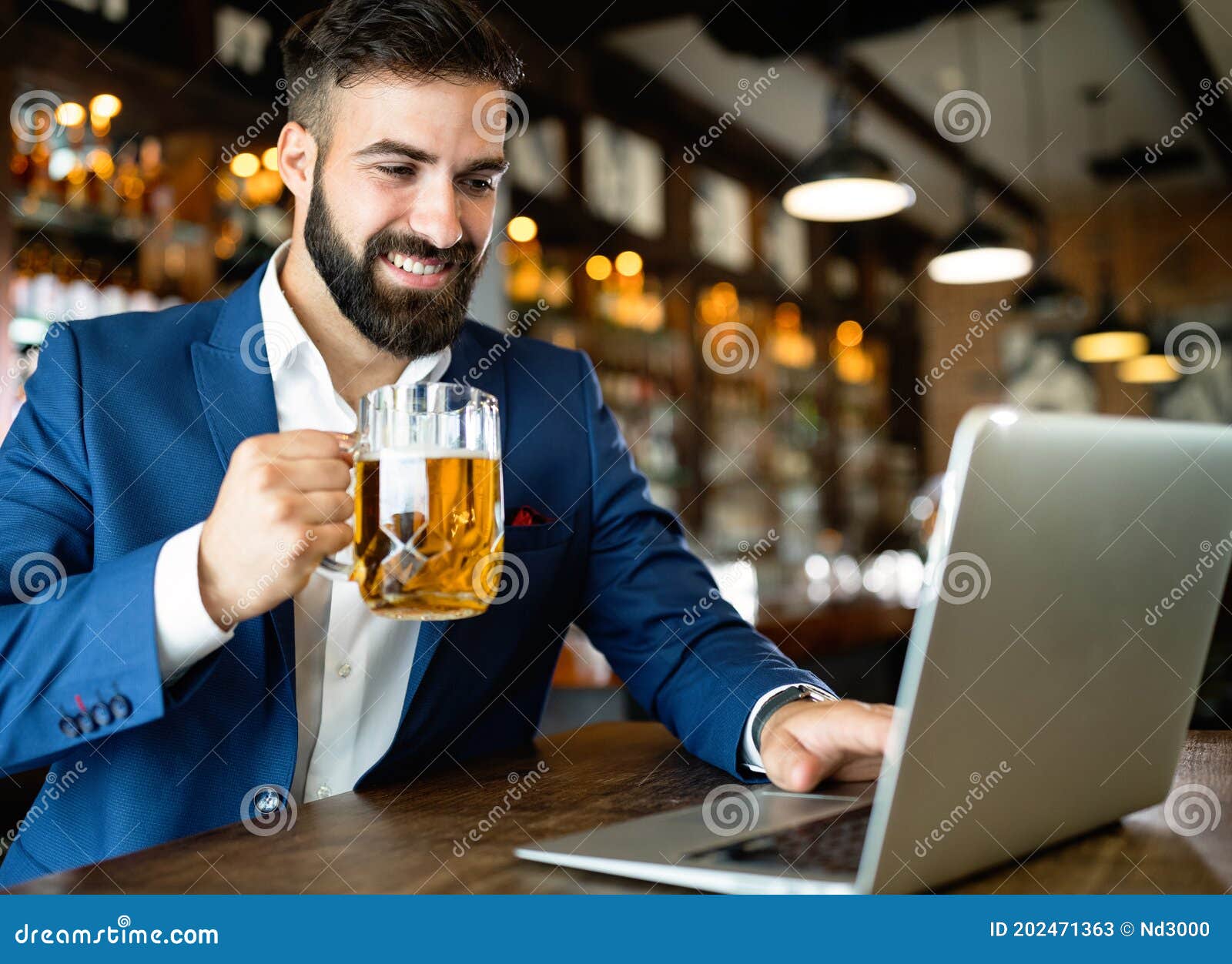 Handsome Business Man Using Laptop at His Work Break in Restaurant ...