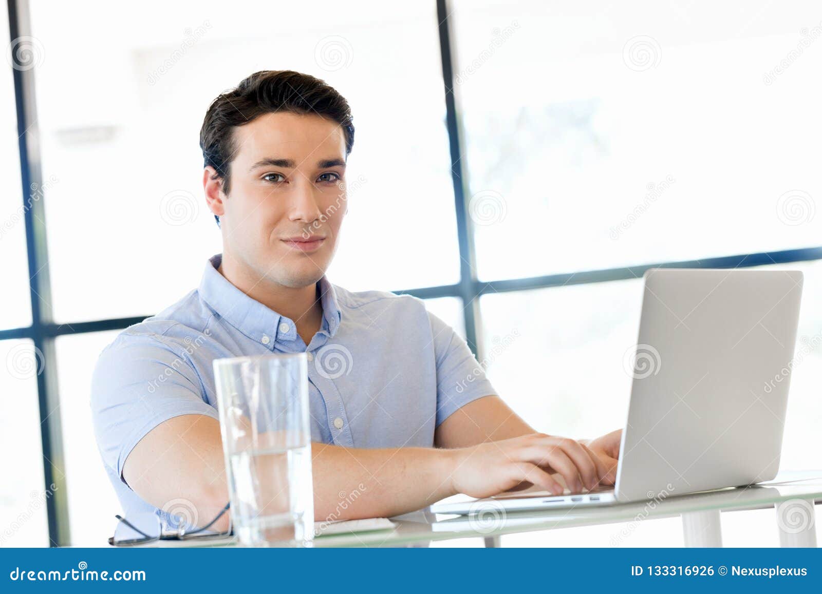 Handsome Businessman Working at Computer Stock Photo - Image of ...