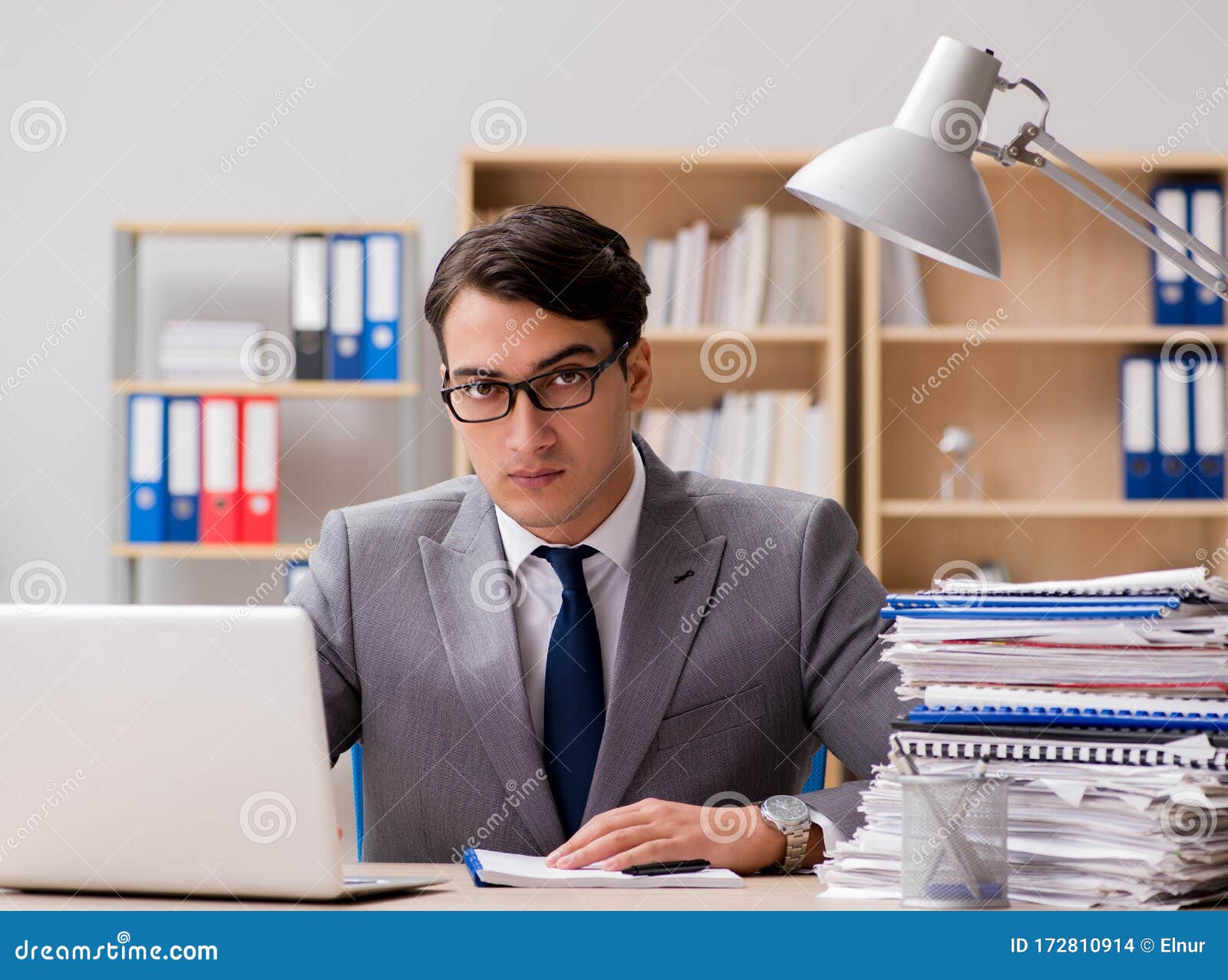 Handsome Businessman Working in the Office Stock Photo - Image of desk ...