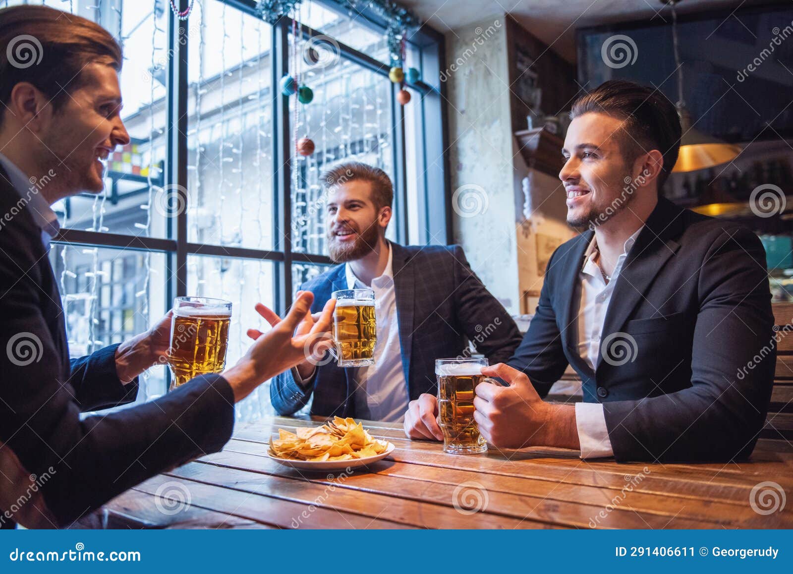 Men at the pub stock image. Image of holding, manager - 291406611