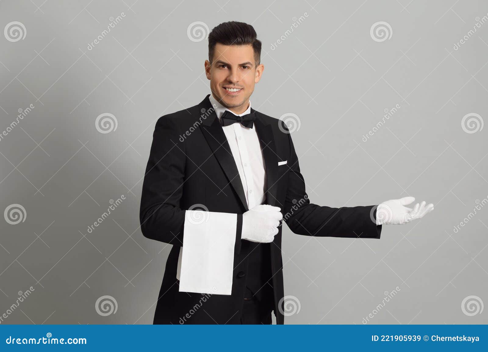 Handsome Butler In Elegant Uniform On Grey Background Stock Photography ...