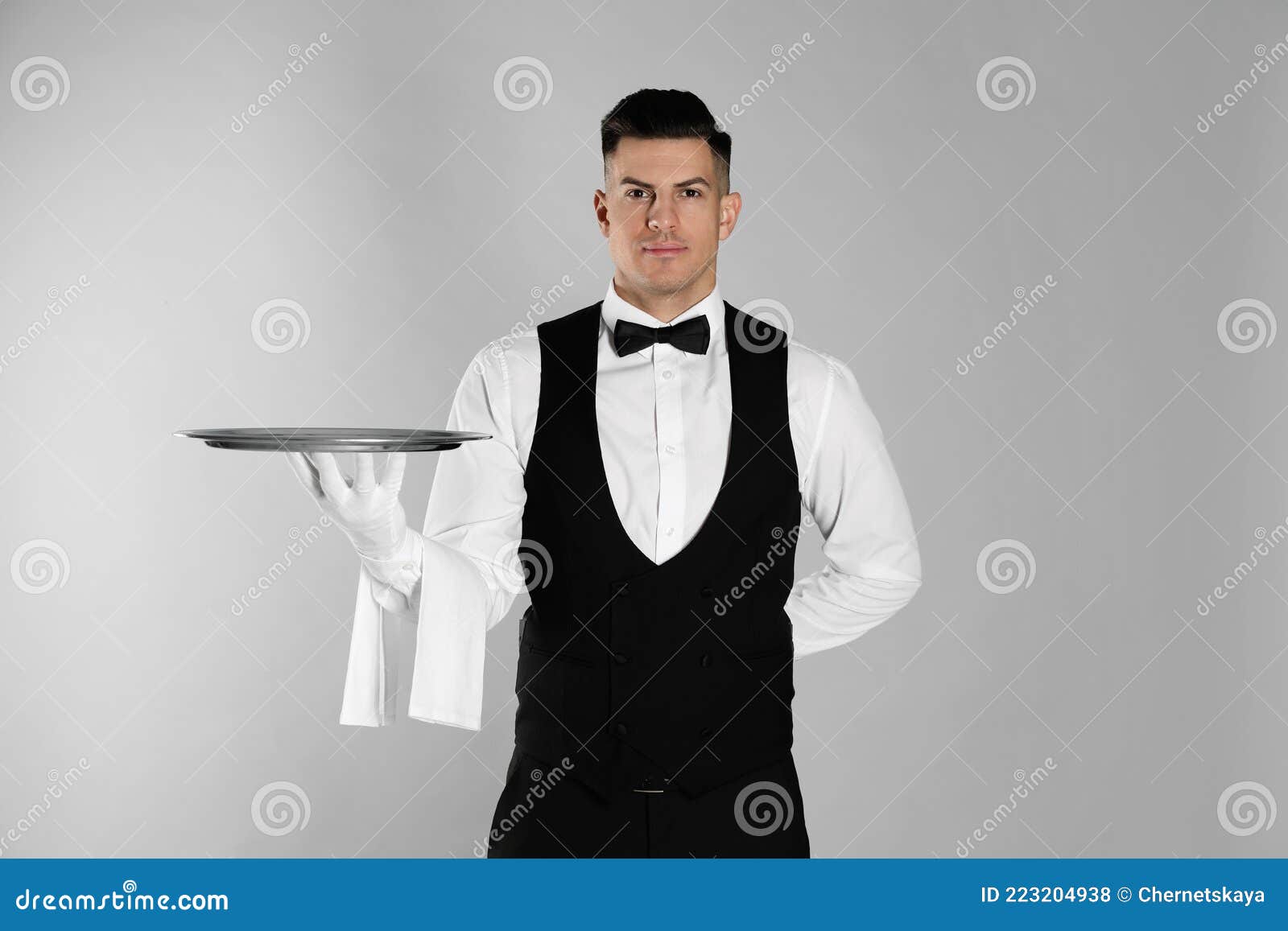 Handsome Butler with Tray on Light Grey Background Stock Photo - Image ...
