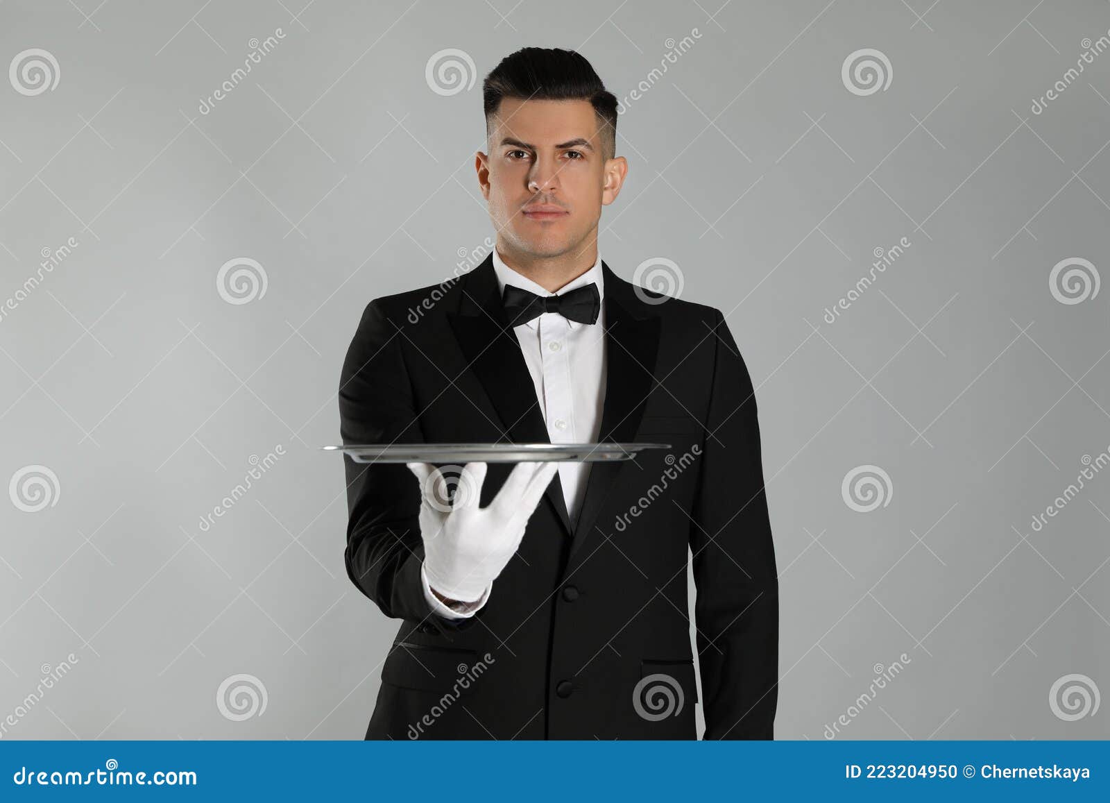 Handsome Butler with Tray on Light Grey Background Stock Photo - Image ...