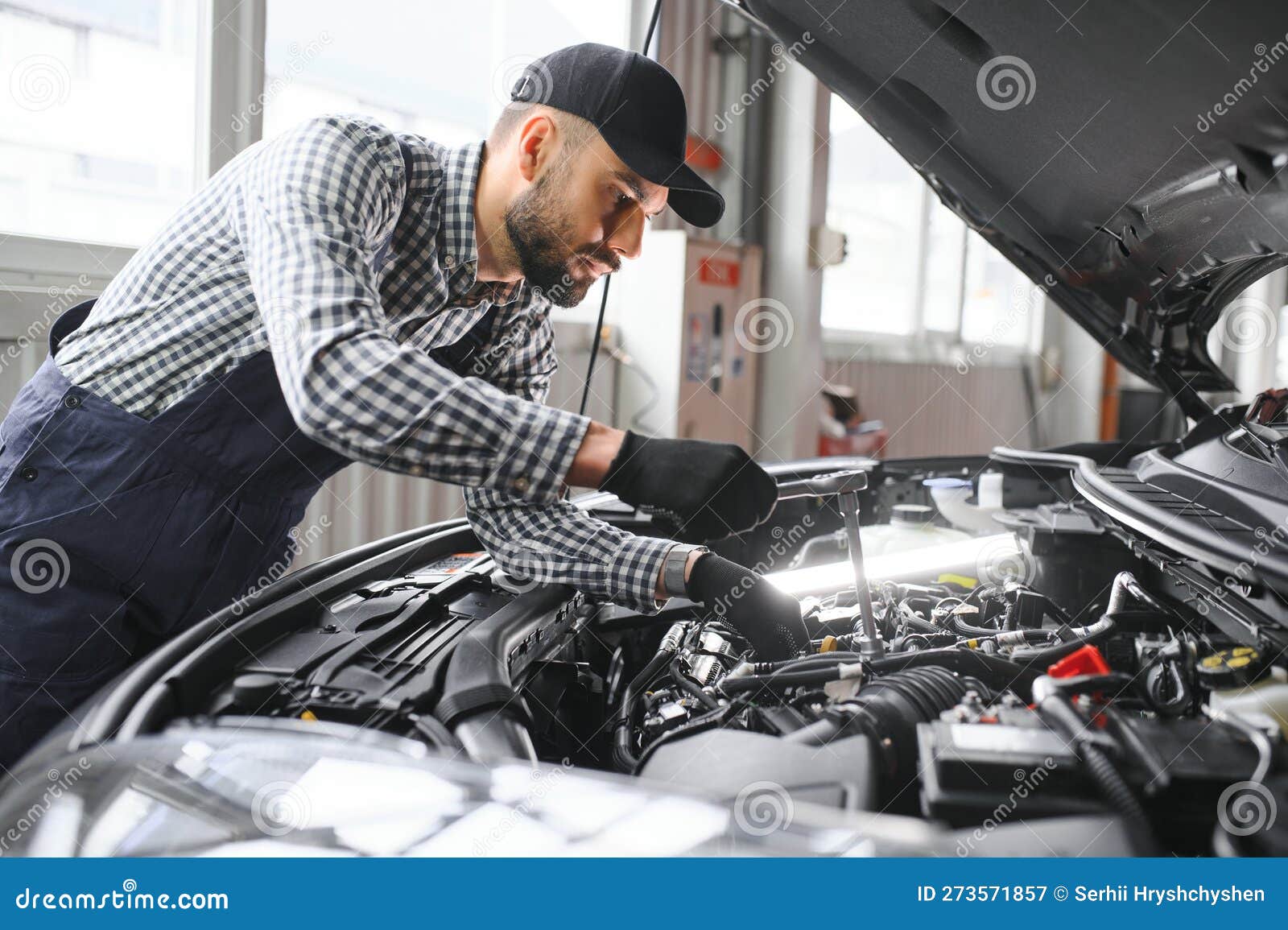 Handsome Car Mechanic is Posing in a Car Service. Stock Image - Image ...