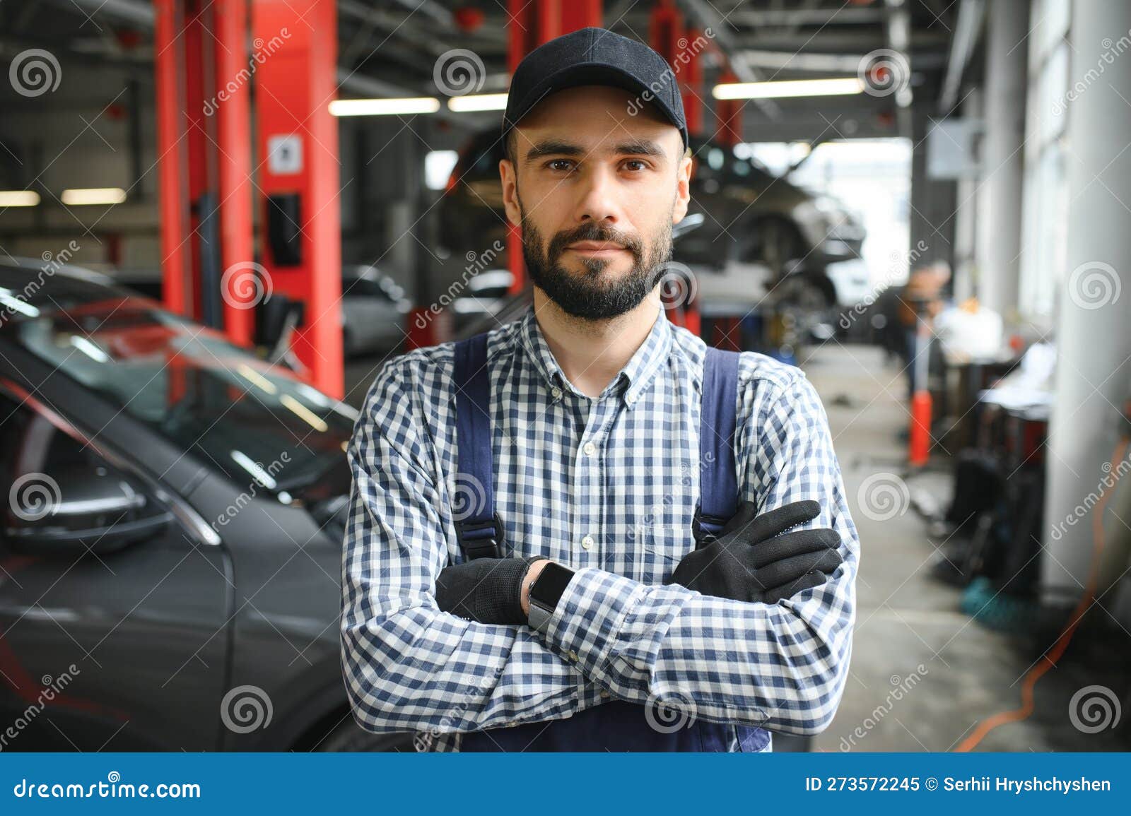 Handsome Car Mechanic is Posing in a Car Service. Stock Image - Image ...