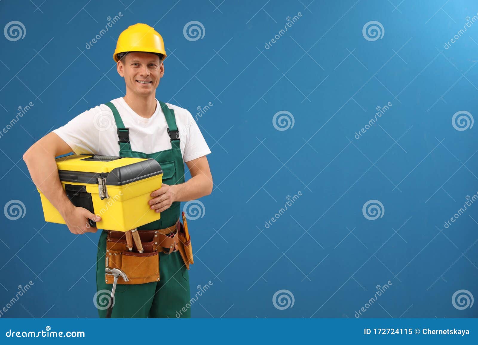 Handsome Carpenter with Tool Box on Background. Space for Text Stock ...