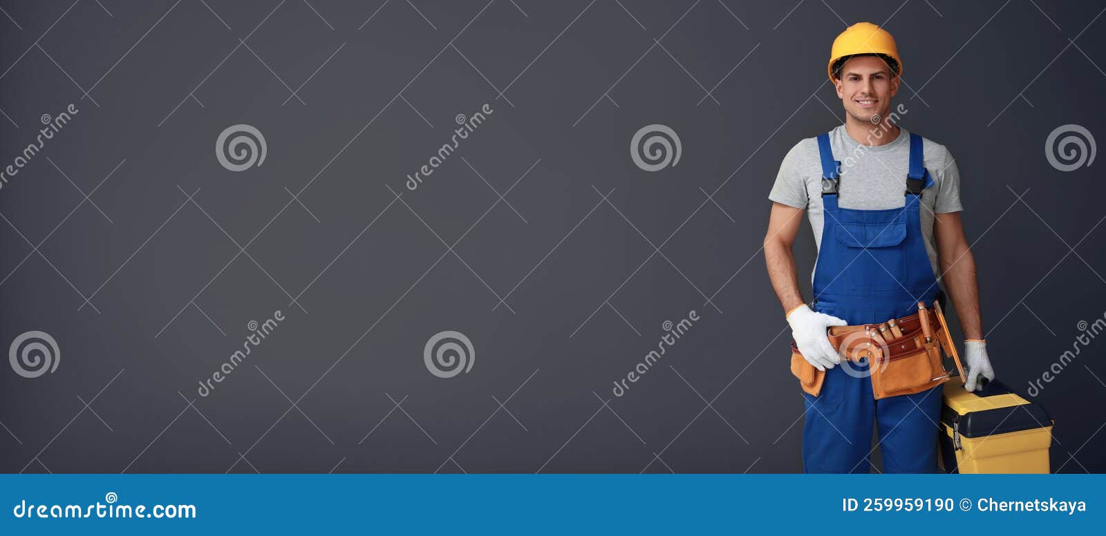 Handsome Carpenter with Tool Box on Dark Background, Space for Text ...