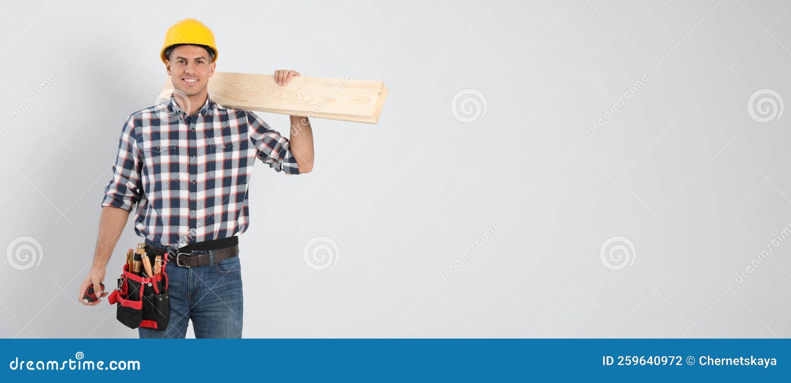 Handsome Carpenter with Wooden Planks on Light Background, Space for ...