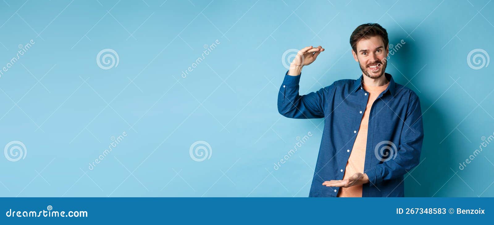 Handsome Caucasian Guy Showing Something Big, Shaping Large Size Object ...