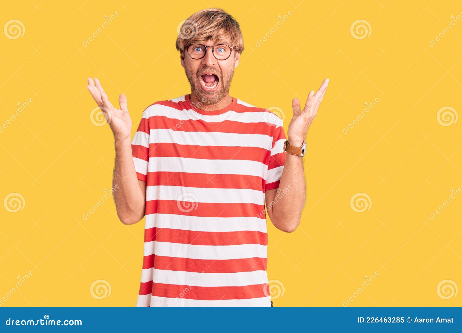 Handsome Caucasian Man With Beard Wearing Casual Clothes And Glasses
