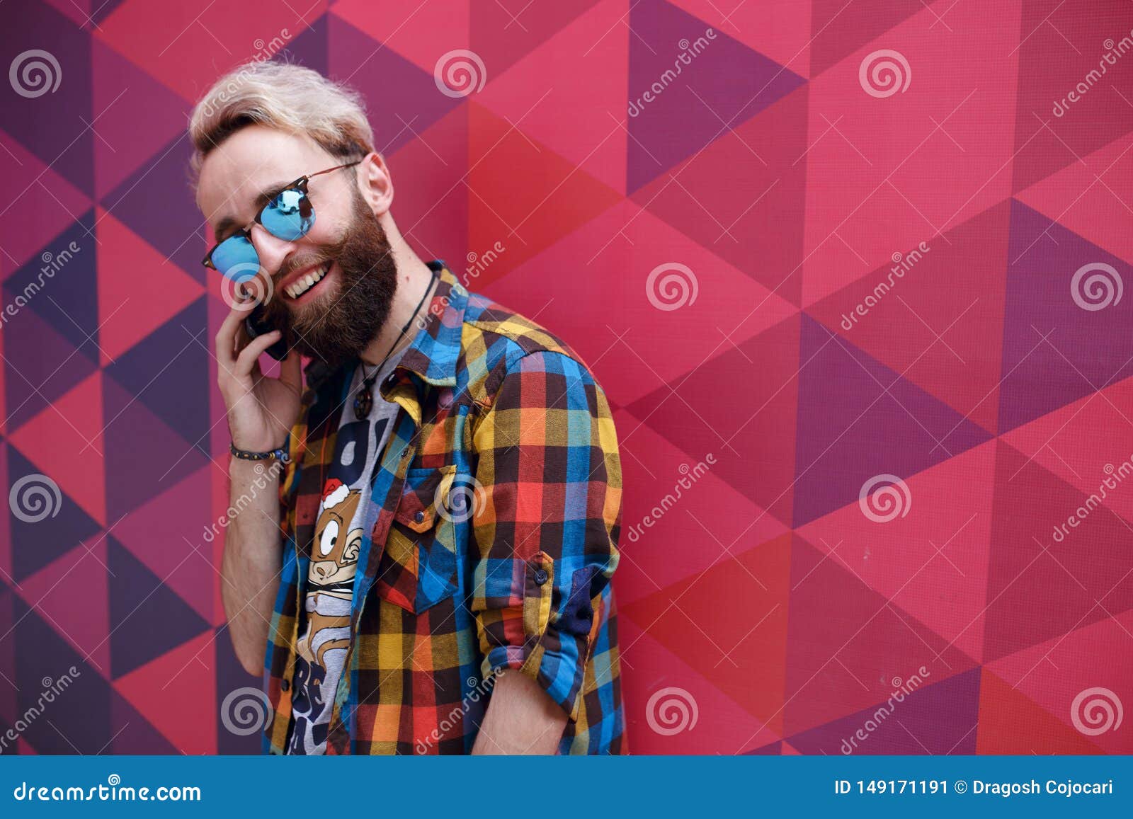Handsome Charismatic Young Man Talking on Mobile Phone, on a ...