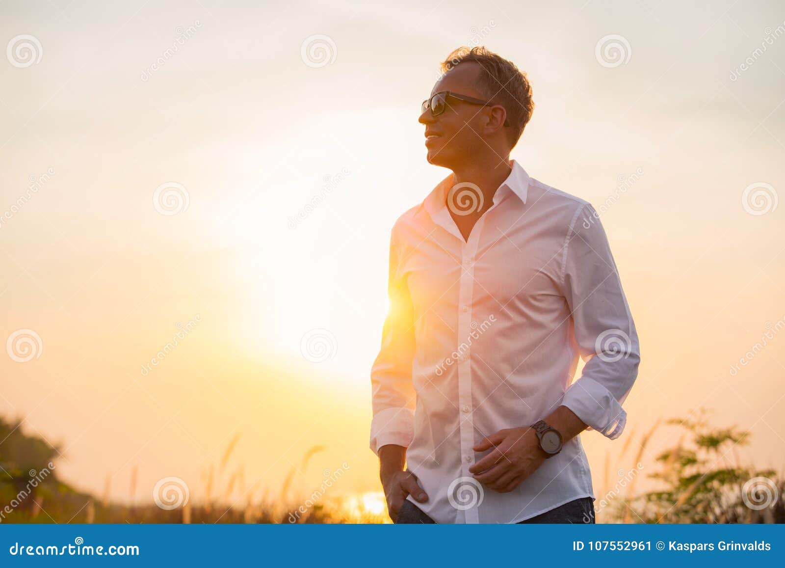 Handsome Man in White Shirt Standing in Sunset Stock Image - Image of ...