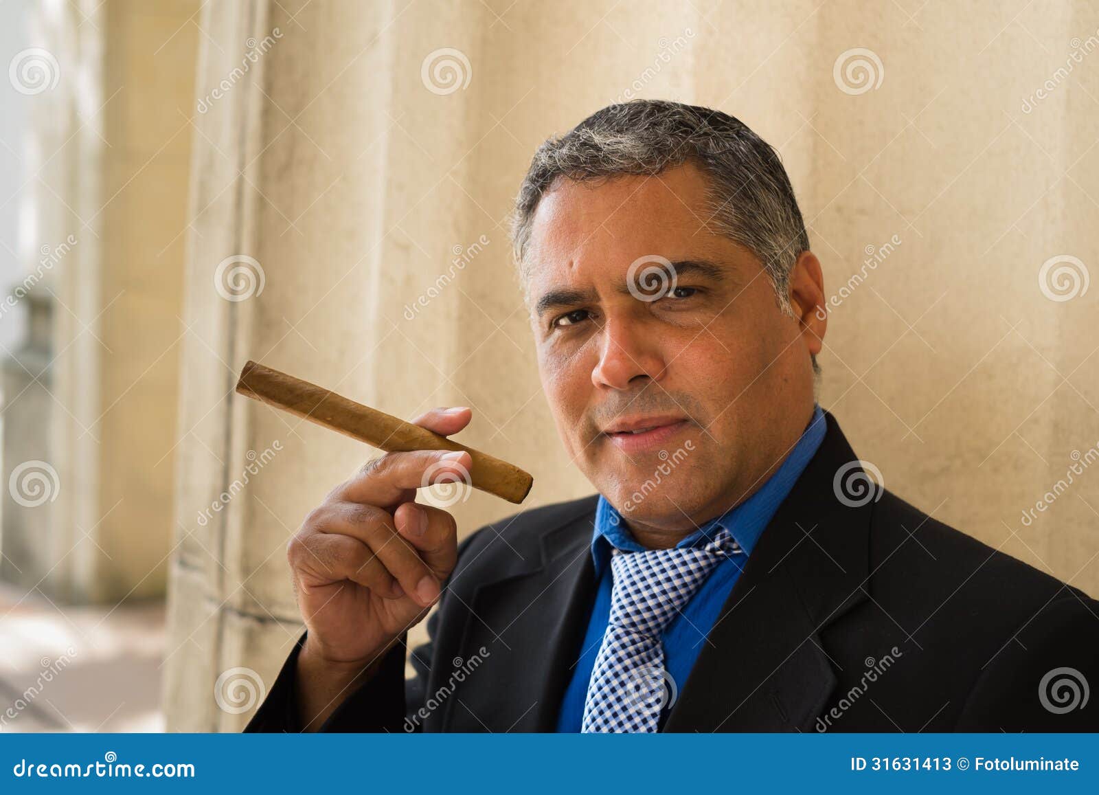 Handsome cigar smoker stock image. Image of latin, dress - 31631413