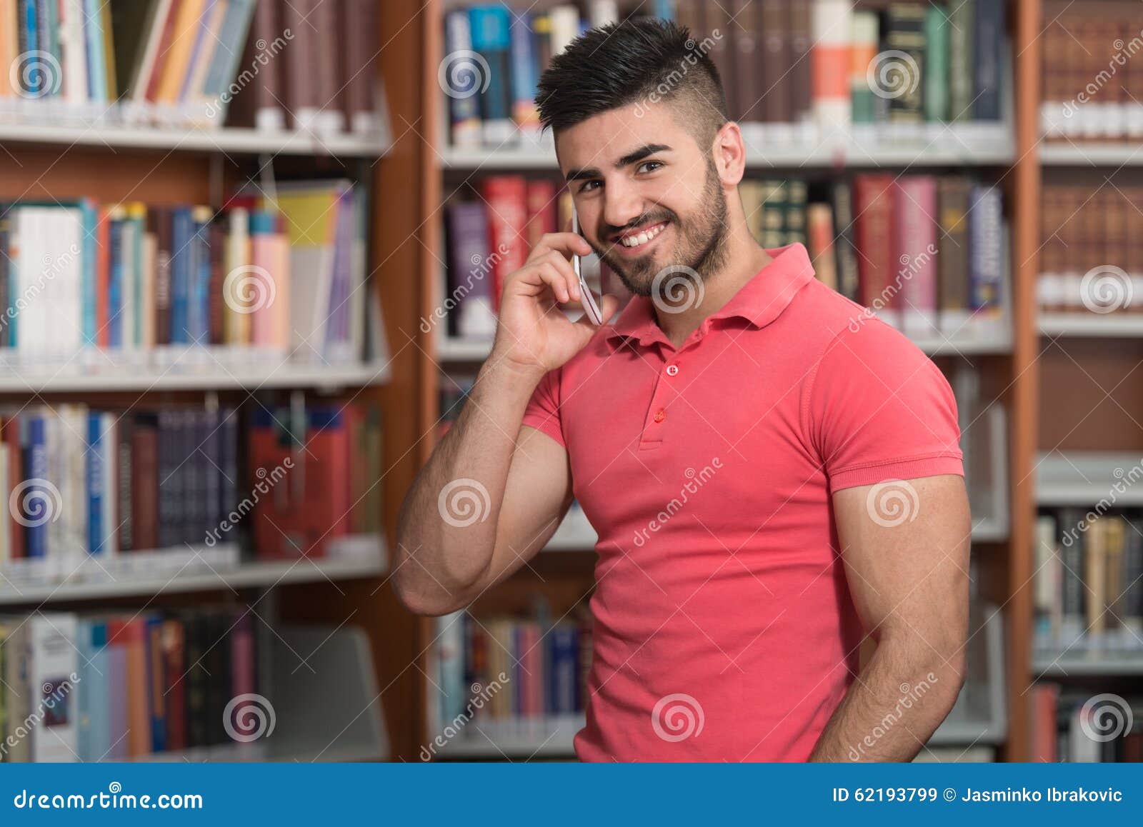 Handsome College Student Using Mobile Phone in Library Stock Image ...