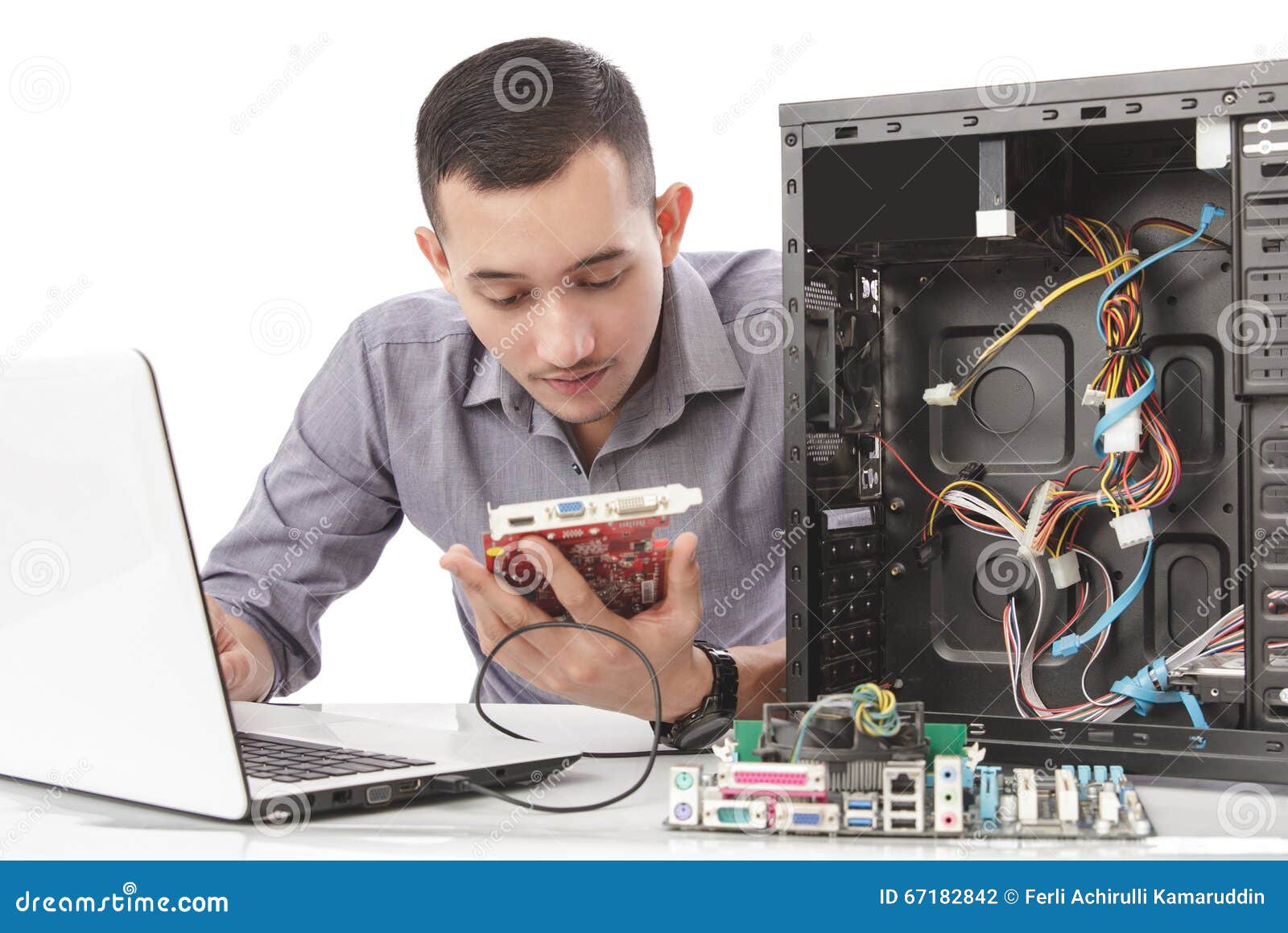 Handsome Computer Specialist Repairing Computer with Full Concentration ...