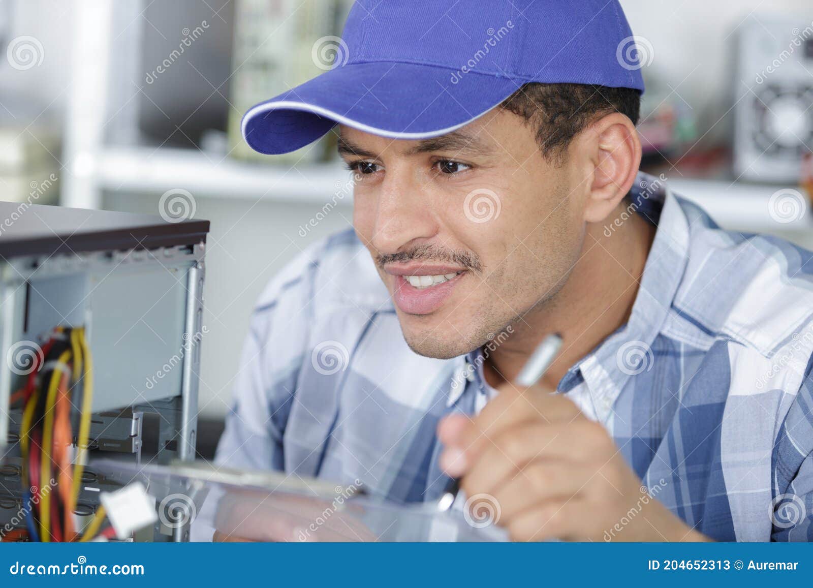 Handsome Computer Technician Writing Notes Stock Image - Image of ...